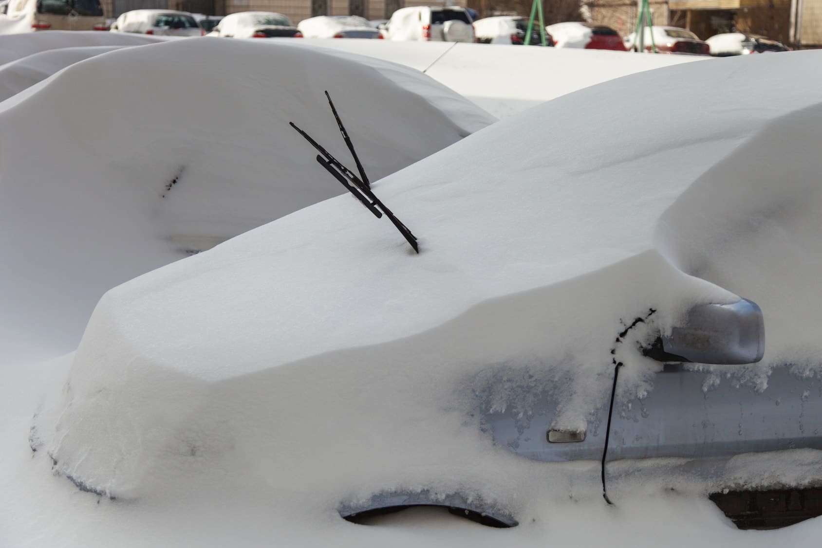 Why Put Windshield Wipers Up in Snow | NuVision Auto Glass